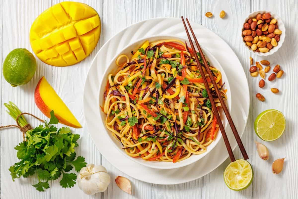 Thai Noodle Salad with Mango and Spicy Peanut Dressing - The Bite Stuff